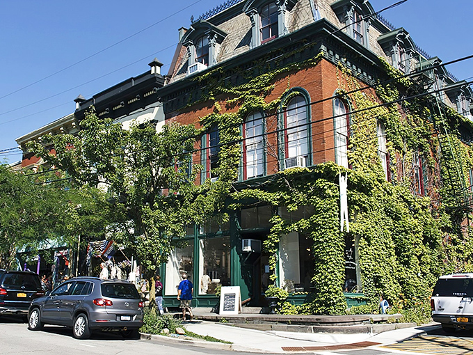 Ivy-draped brick buildings line Cold Spring's Main Street, where 19th-century architecture meets modern charm &ndash; nature's way of saying "I've got this decorating thing covered."