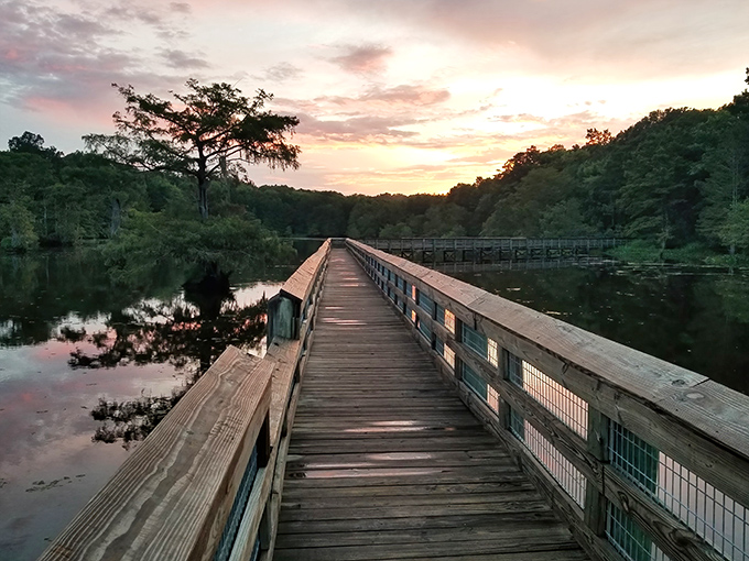 A wooden bridge beckons you toward lake views that'll make you forget whatever stress you drove in with this morning.