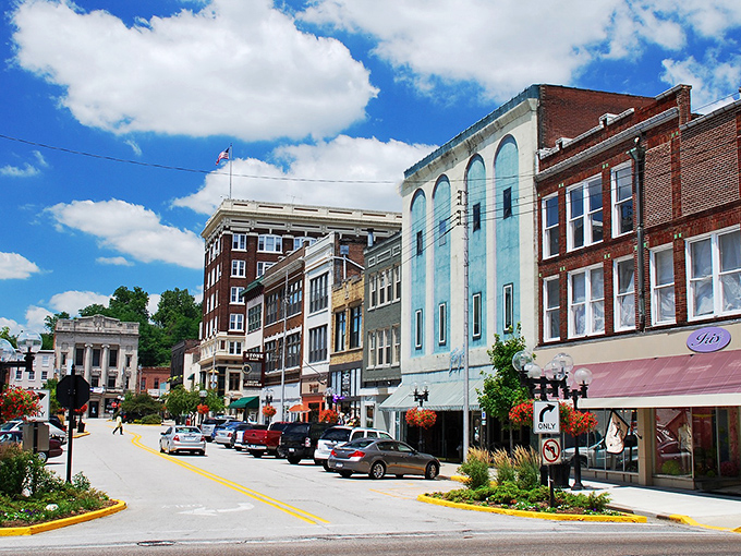 Downtown Alton's historic architecture stands proudly against a perfect blue sky, like a movie set where everyone knows your coffee order.