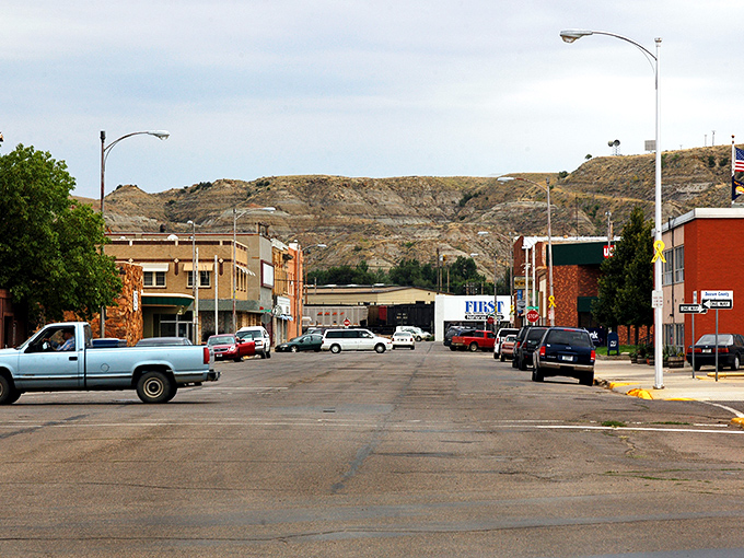 Main Street Glendive offers that perfect small-town Montana vibe with badlands dramatically rising in the background &ndash; nature's own theatrical backdrop.