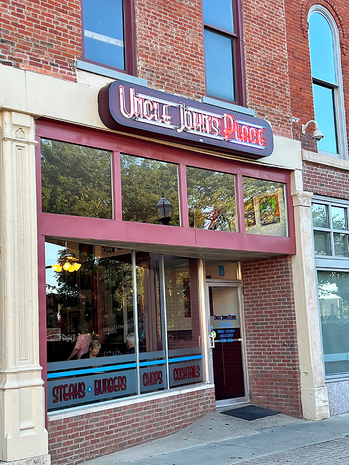 That vintage neon sign beckons like an old friend, promising the kind of honest-to-goodness meal that doesn't need a filter to impress.