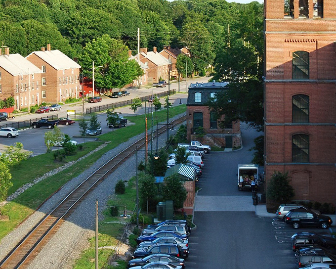 Where history rides the rails: Cumberland's restored mill buildings and worker housing create a living museum of America's industrial past.