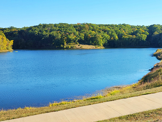 Lake Lincoln's crystal-blue waters reflect the surrounding forest like nature's own mirror. Missouri's best-kept secret hides in plain sight at Cuivre River State Park.