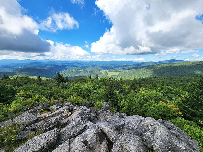 Standing on the rocky peak with a view that goes forever! A beautiful, serene escape to enjoy the great outdoors.