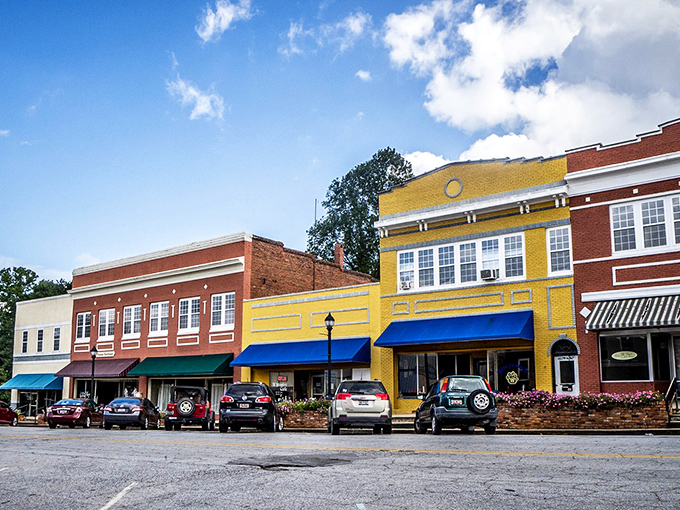 Downtown's vibrant palette tells stories without saying a word. That sunshine-yellow building isn't just a structure &ndash; it's a mood elevator.