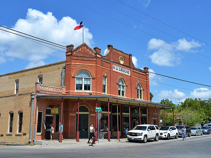H.D. Gruene's legacy lives on in this beautifully preserved brick storefront, where modern visitors stroll past architecture that's witnessed over a century of Texas tales.