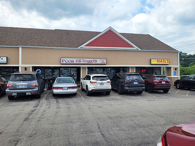 The humble facade of Poor Richard's in Fenton holds the secret to truly legendary potato skins and great company!