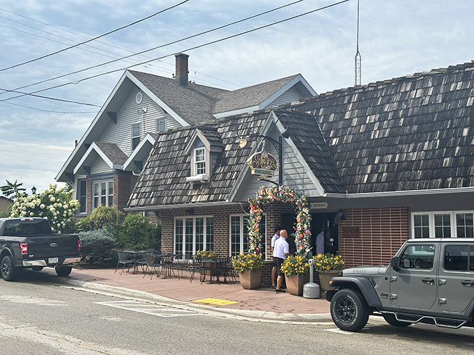 The storybook charm of Schwarz's exterior welcomes you like an old friend, complete with flower-adorned entrance and that iconic shingled roof that screams "Wisconsin supper club magic."