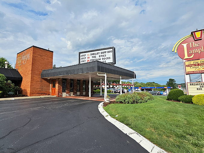 The brick exterior of The Lamplighter stands like a culinary lighthouse in Delmont, beckoning hungry travelers with its vintage charm and promise of comfort food excellence.
