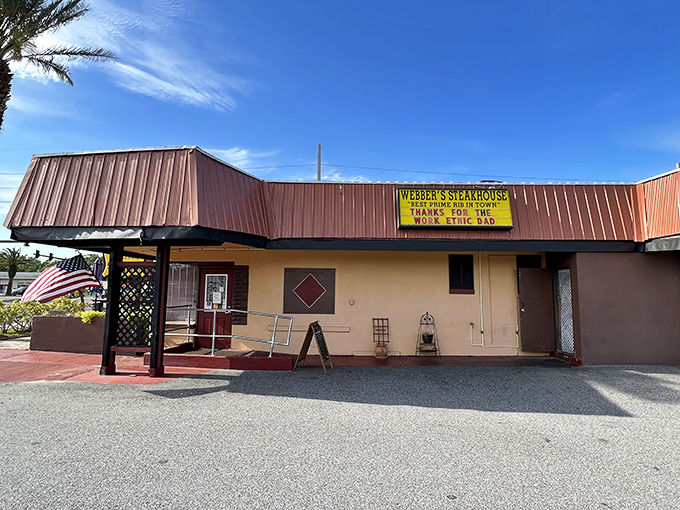 Don't let the modest exterior fool you—this unassuming building houses flavor explosions that will rewrite your definition of "steakhouse perfection."