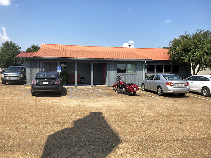 The unassuming exterior of Hot Rod Bar-B-Q stands like a beacon of hope for hungry travelers. Good barbecue rarely needs fancy architecture to announce itself.