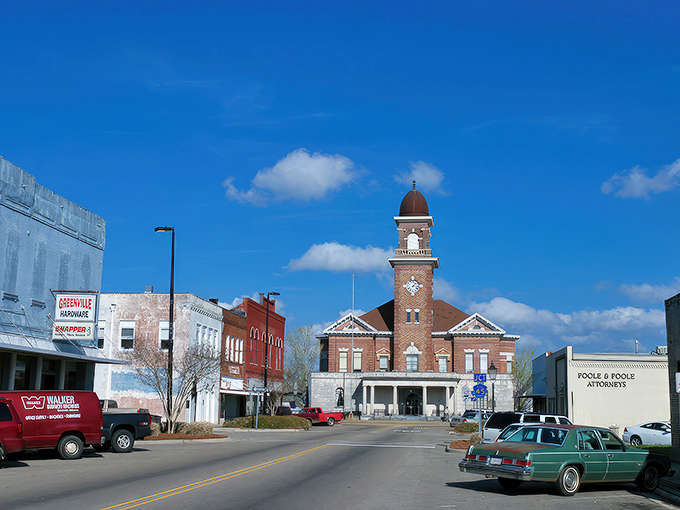 The Butler County Courthouse stands sentinel in downtown Greenville, its brick tower reaching skyward like the town's aspirations&mdash;modest, sturdy, and undeniably charming.