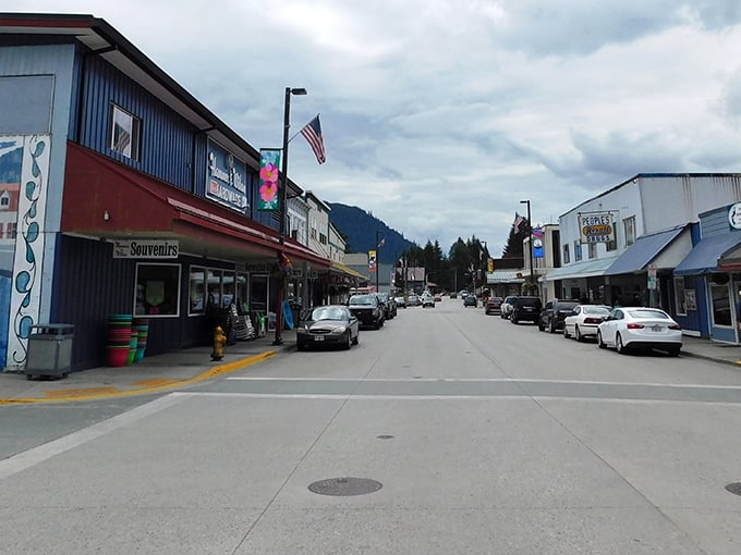 Main Street, Petersburg – where American flags wave proudly and mountains stand guard over everyday Alaskan life.