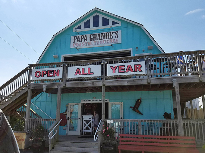 Daylight reveals the cheerful Caribbean blue exterior that stands out like a delicious mirage. This barn wasn't built for hay&mdash;it was destined for margaritas and memorable meals.