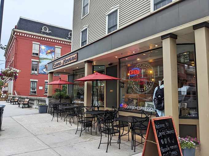 The perfect Vermont morning starts here: Capitol Grounds' inviting storefront with those signature red umbrellas beckoning you like an old friend on State Street.