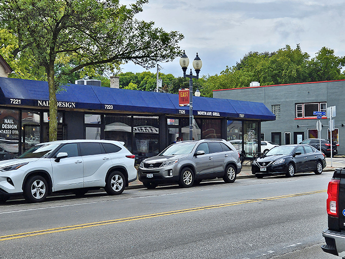That distinctive blue awning on North Avenue marks the spot where breakfast dreams come true every single morning.