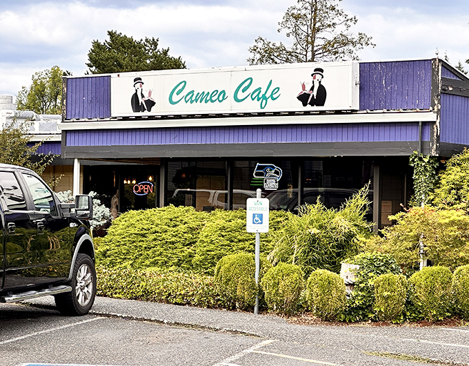 The distinctive purple exterior of Cameo Cafe stands out like a culinary beacon in Vancouver, promising comfort food treasures within those unassuming walls.
