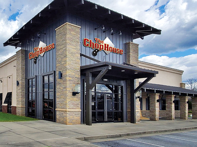 The Chop House's exterior combines rustic charm with modern flair, like that friend who wears cowboy boots with designer jeans and somehow pulls it off perfectly.