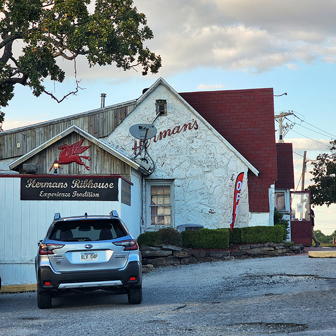 Herman's "Experience Tradition" sign isn't just marketing&mdash;it's a promise delivered through decades of serving Fayetteville's most devoted carnivores.