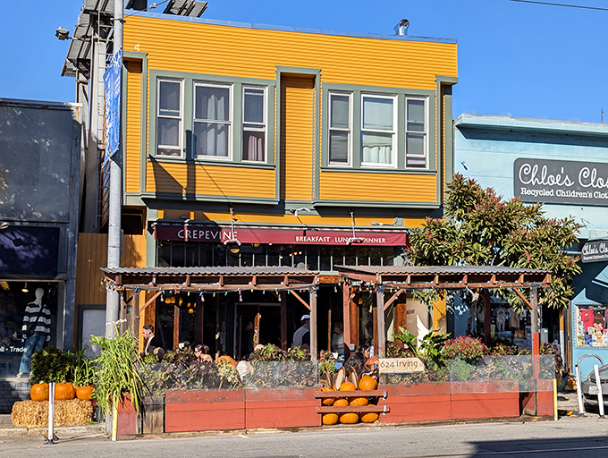 The cheerful yellow facade of Crepevine stands out like a beacon of breakfast hope on this San Francisco street corner.