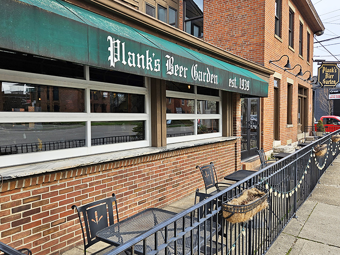 The iconic green awning of Plank's Bier Garten welcomes you like an old friend who's been waiting on that porch since 1939.