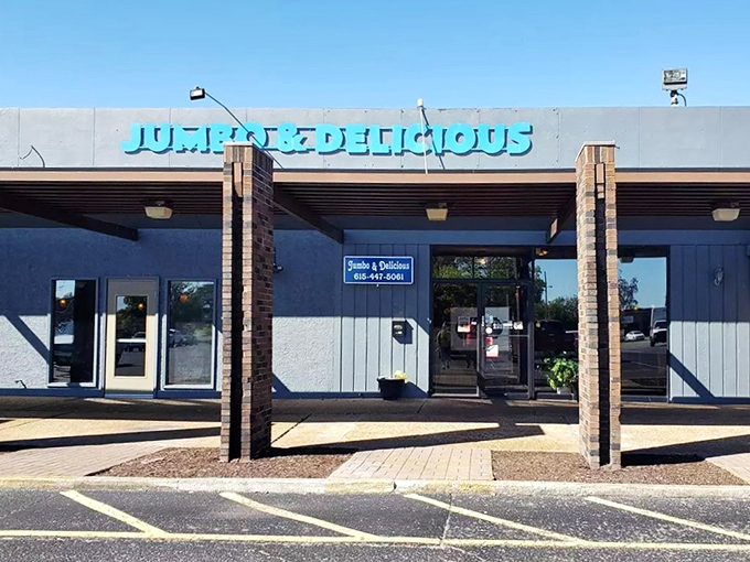 The unassuming blue storefront of Jumbo & Delicious stands like a beacon for burger aficionados, promising satisfaction without pretension in suburban Hendersonville.