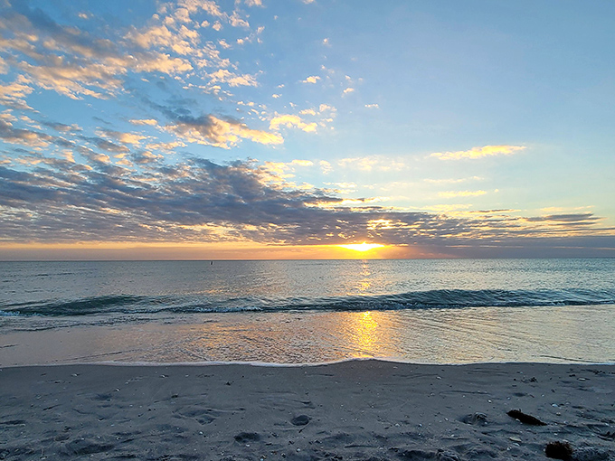Experience breathtaking sunsets at Manasota Key Beach in Englewood, Florida! Perfect waves, soft sand, and stunning skies await your visit today!