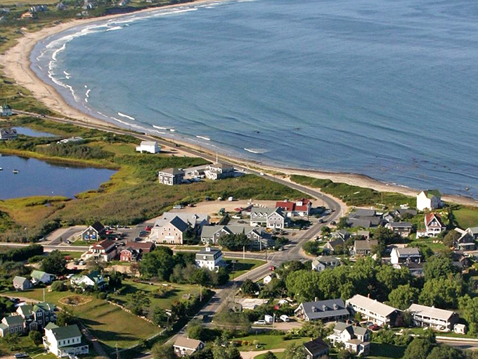 A breathtaking aerial perspective showing how Block Island's curved beaches embrace the Atlantic like a gentle hug.