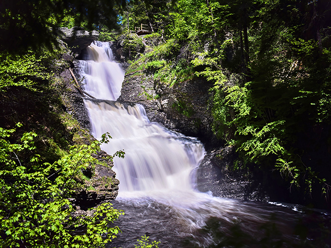 Nature's three-tiered masterpiece puts on a show that would make Broadway jealous. Raymondskill Falls cascades dramatically through lush Pennsylvania greenery.