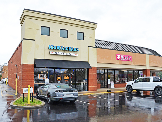 The bright blue sign of Krustaceans stands out like a beacon for seafood lovers, promising oceanic treasures in landlocked Nashville.