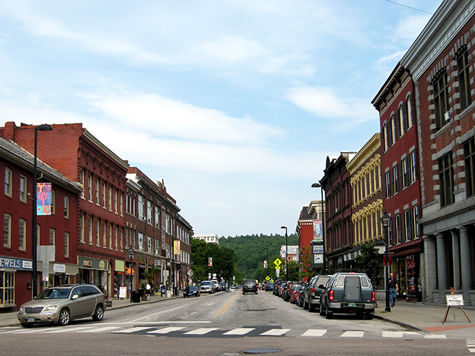 Main Street Montpelier welcomes you with its classic brick facades and mountain backdrop &ndash; small-town charm with just enough bustle to keep things interesting.