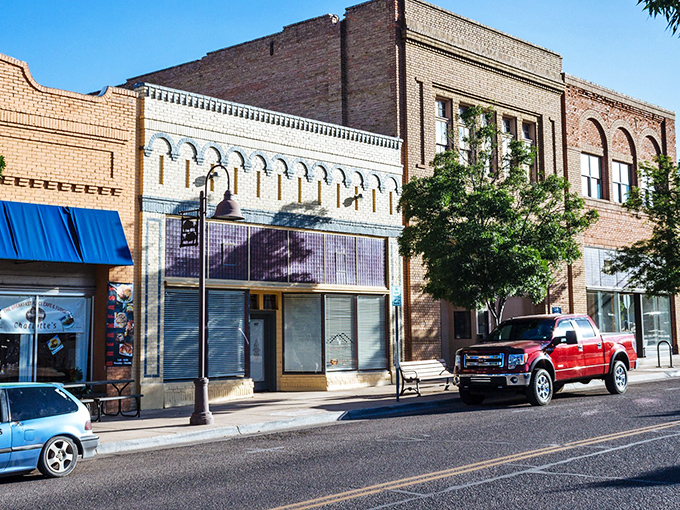 Historic brick buildings line Clarkdale's Main Street, where time slows down and nobody's checking their phone notifications. Small-town charm at its finest.