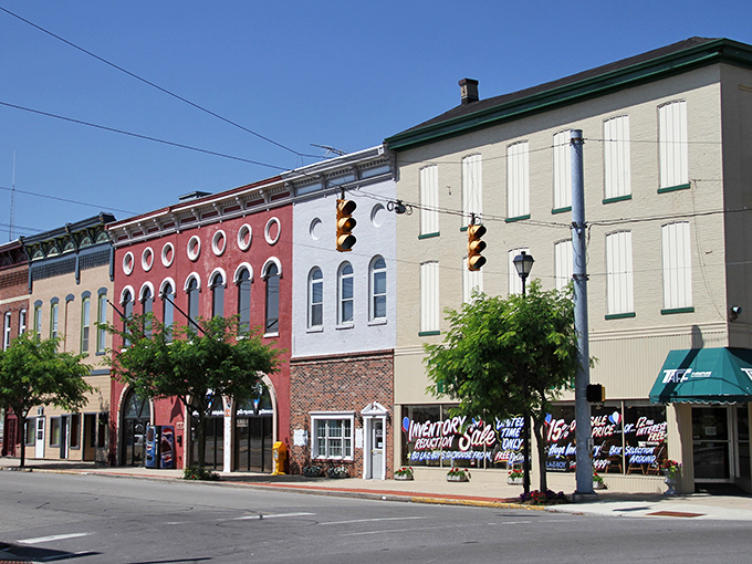 The vibrant streetscape of Greensburg showcases a rainbow of architectural styles, proving that Midwestern downtowns can be both affordable and Instagram-worthy.