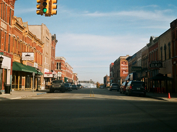 Historic downtown streets where architecture still remembers what craftsmanship means and time moves at walking speed.