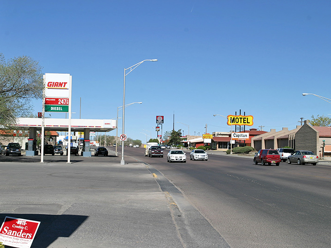 Route 66 nostalgia meets everyday practicality where classic motels neighbor the essentials of modern life.