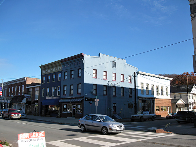 The blue corner building anchors this stretch of downtown Honesdale, where you can stroll without encountering a single big-box retailer or overpriced coffee chain.