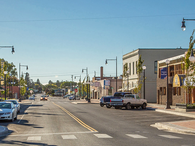 Downtown Sunnyside stretches out like a postcard from simpler times, complete with vintage lampposts and unhurried traffic.