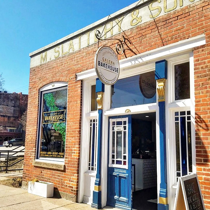 The historic Slattery & Son building now houses Galena Bakehouse, where those blue doors promise sweet salvation for carb enthusiasts.