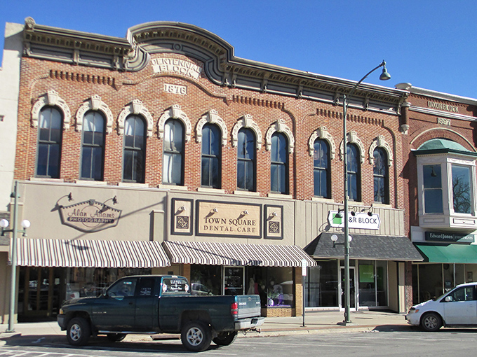 Historic charm meets small-town economics on Oskaloosa's town square, where these brick buildings have witnessed generations of Iowans living well within their means.