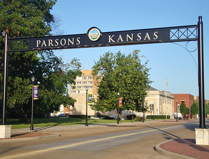 The iconic Parsons gateway arch welcomes visitors with small-town charm that's as genuine as a handshake from your favorite neighbor.