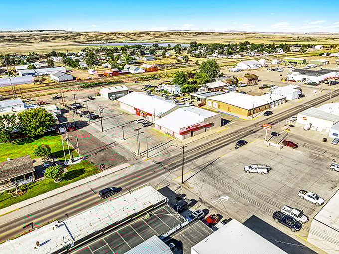 From this bird's-eye view, Plentywood reveals itself as a perfect grid of possibility surrounded by endless prairie.