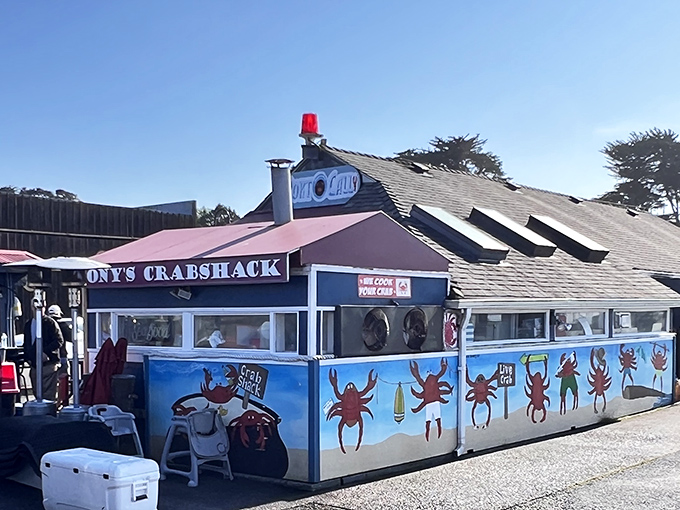 Tony's Crab Shack sits roadside like a red-roofed beacon calling hungry travelers to seafood paradise.
