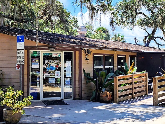 Captain's BBQ stands proudly under ancient oaks, where Florida's natural beauty sets the stage for a barbecue revelation waiting inside.