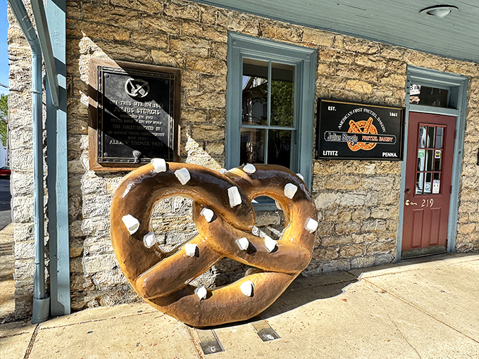 The historic stone facade of Julius Sturgis beckons with its bright blue trim and giant pretzel sculpture&mdash;a carb-lover's Stonehenge in charming Lititz.