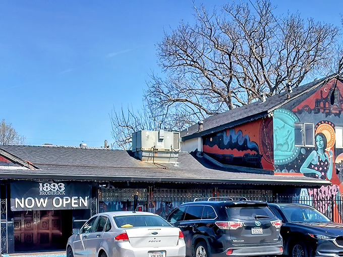 Colorful murals and a "NOW OPEN" sign welcome hungry visitors. This isn't just a restaurant&mdash;it's West Sacramento's answer to burger paradise.