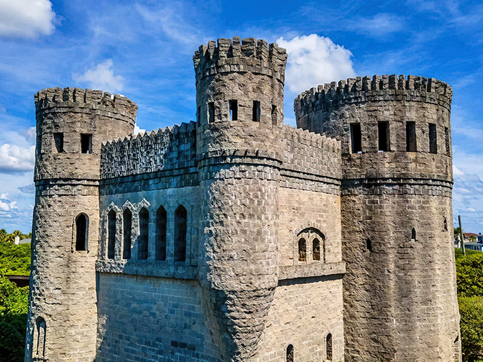 The castle's imposing facade captures the essence of 12th-century Irish architecture, complete with crenellated towers and narrow defensive windows.
