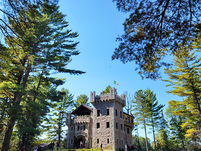 Kelley Castle emerges from the Northwoods like a medieval mirage, its stone towers and Irish flag creating a European oasis among Wisconsin pines.