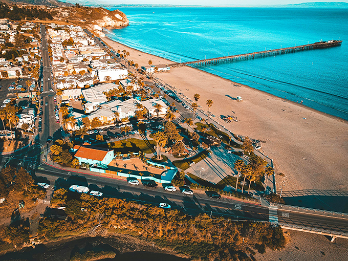Avila Beach from above looks like California decided to show off what paradise should actually look like – complete with that pier stretching into impossibly blue waters.
