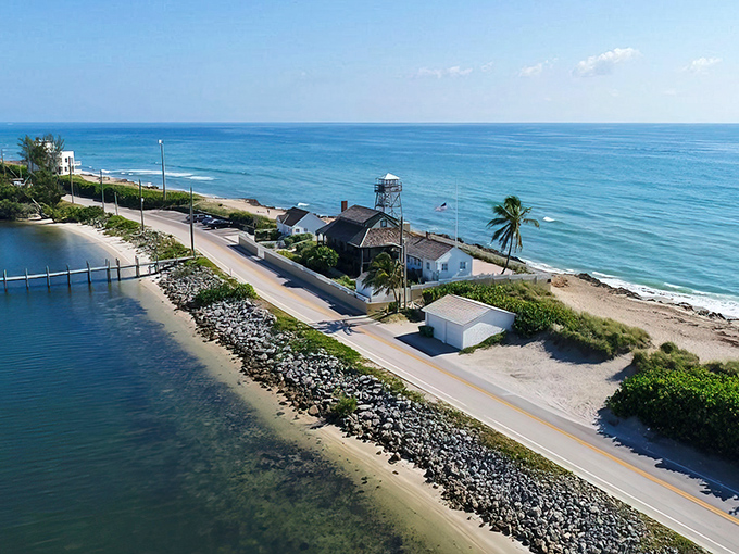 Aerial paradise! Jensen Beach's coastline stretches like nature's welcome mat, with turquoise waters meeting pristine sand while condominiums stand as modern-day lighthouses for beach lovers.