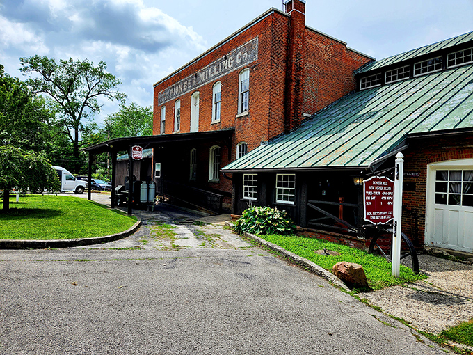 The historic Pioneer Mill building stands proudly in Tiffin, its red brick facade and "PIONEER MILLING CO." signage hinting at delicious transformations within.